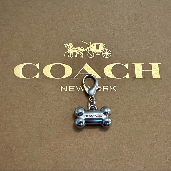 Coach | Accessories | Coach Silver Dog Bone Wristlet Bag Charm | Poshmark
